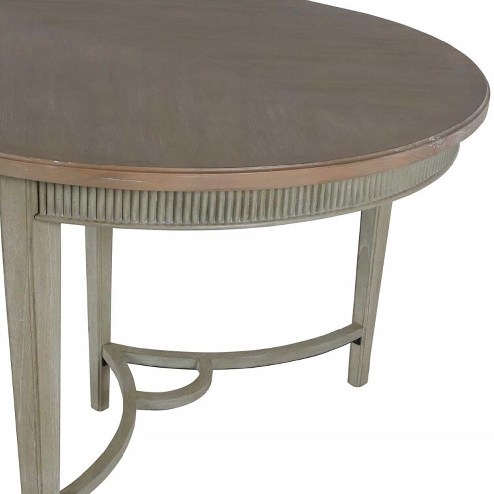 Whitlock Natural Wood Patterned Extendable Oval Dining Table - 86-106"W